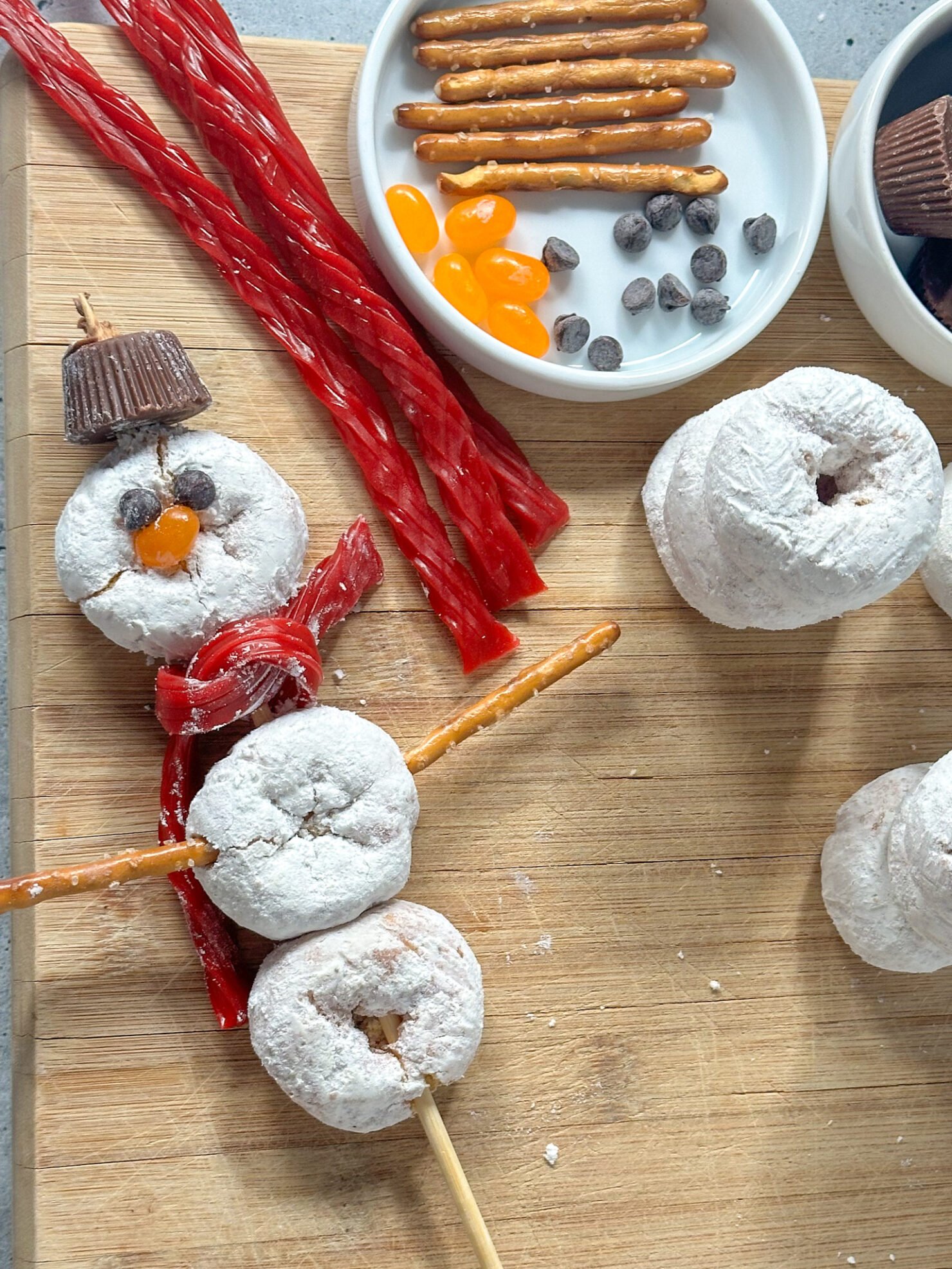 Snowman Donut Skewers (Easy Holiday Treat!) - The Tasteful Tribe