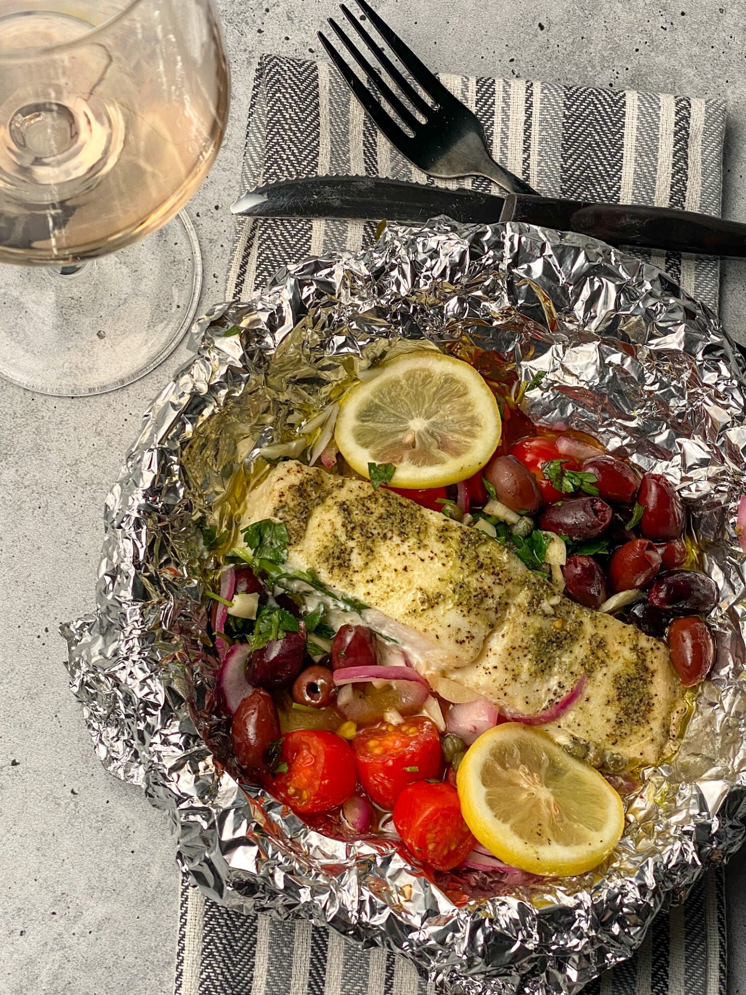 The Best Mediterranean Baked Fish in Foil Packets - The Tasteful Tribe