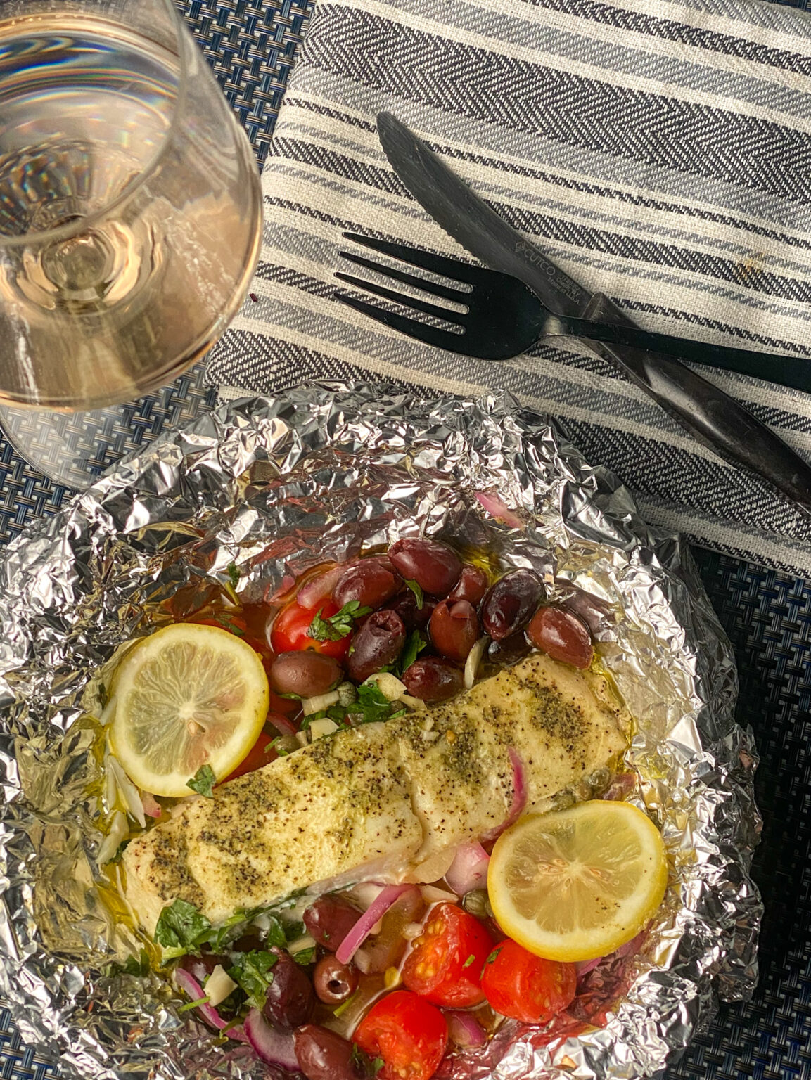 The Best Mediterranean Baked Fish in Foil Packets - The Tasteful Tribe